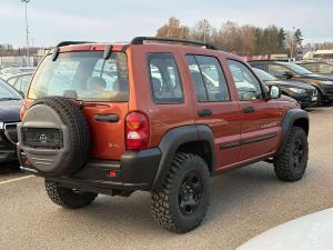 Orange Jeep Cherokee 2005 in Vilnius, with an engine capacity of 3.70 L and mileage of 244 thousand km for 6950 €, photo 4 on AUTOMOTO.COM.LV
