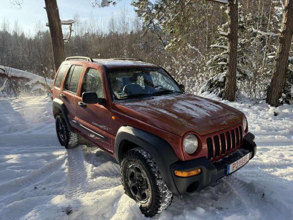 Oranžs Jeep Cherokee 2005 Viļņa, ar dzinēja tilpumu 3.70 L un nobraukumu 244 tūkst. km par 6499 €, foto 1 vietnē AUTOMOTO.COM.LV