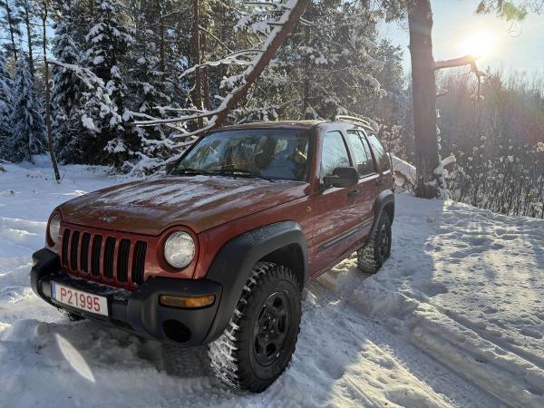Oranžs Jeep Cherokee 2005 Viļņa, ar dzinēja tilpumu 3.70 L un nobraukumu 244 tūkst. km par 6499 €, foto 2 vietnē AUTOMOTO.COM.LV