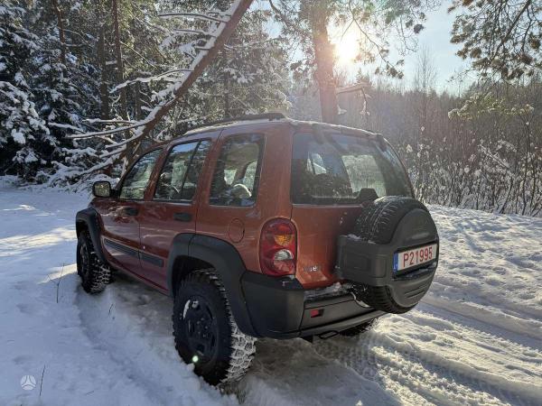 Oranžs Jeep Cherokee 2005 Viļņa, ar dzinēja tilpumu 3.70 L un nobraukumu 244 tūkst. km par 6499 €, foto 4 vietnē AUTOMOTO.COM.LV