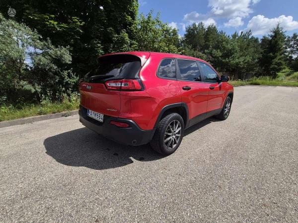 Red Jeep Cherokee 2014 in Vilnius, with an engine capacity of 2.40 L and mileage of 203 thousand km for 6900 €, photo 5 on AUTOMOTO.COM.LV