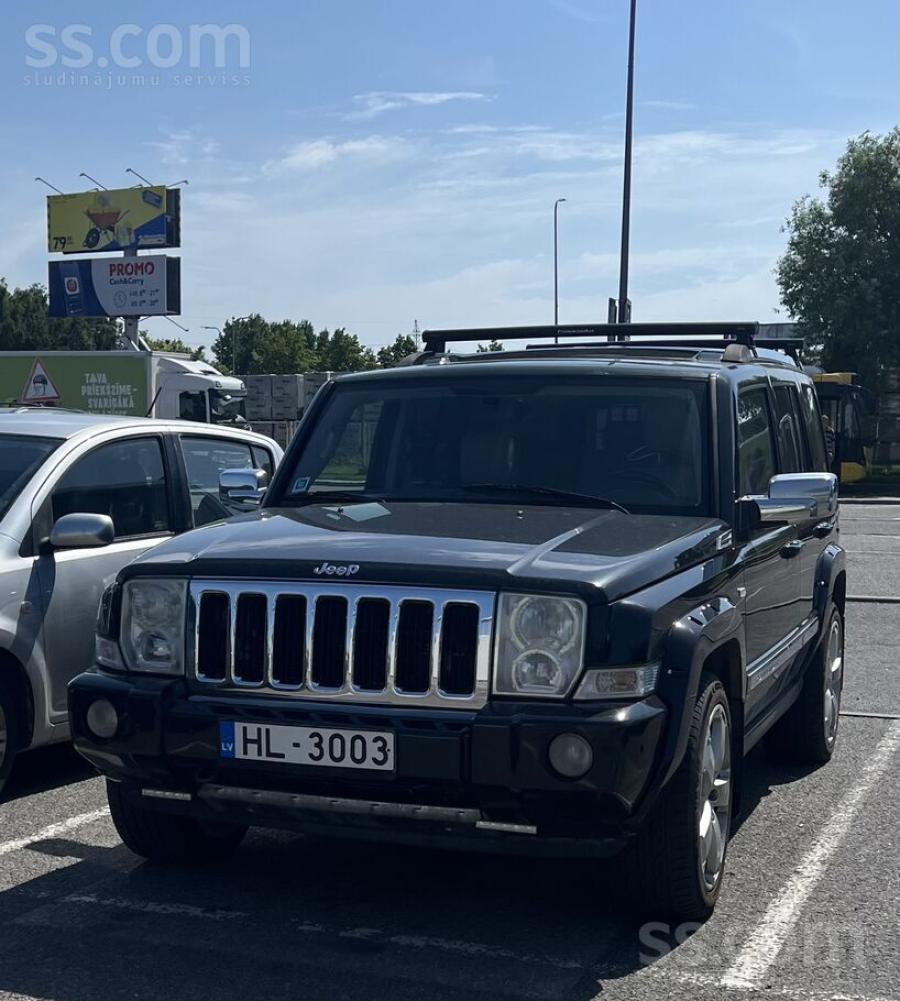Black Jeep Commander 2009 in Riga, with an engine capacity of 3.00 L and mileage of 255 thousand km for 10000 €, photo 1 on AUTOMOTO.COM.LV