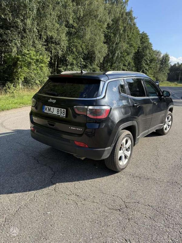 Black Jeep Compass 2018 in Ukmerge, with an engine capacity of 1.96 L and mileage of 254 thousand km for 10500 €, photo 4 on AUTOMOTO.COM.LV