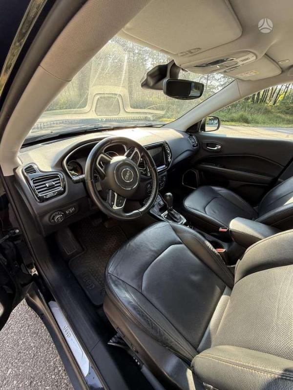 Black Jeep Compass 2018 in Ukmerge, with an engine capacity of 1.96 L and mileage of 254 thousand km for 10500 €, photo 6 on AUTOMOTO.COM.LV