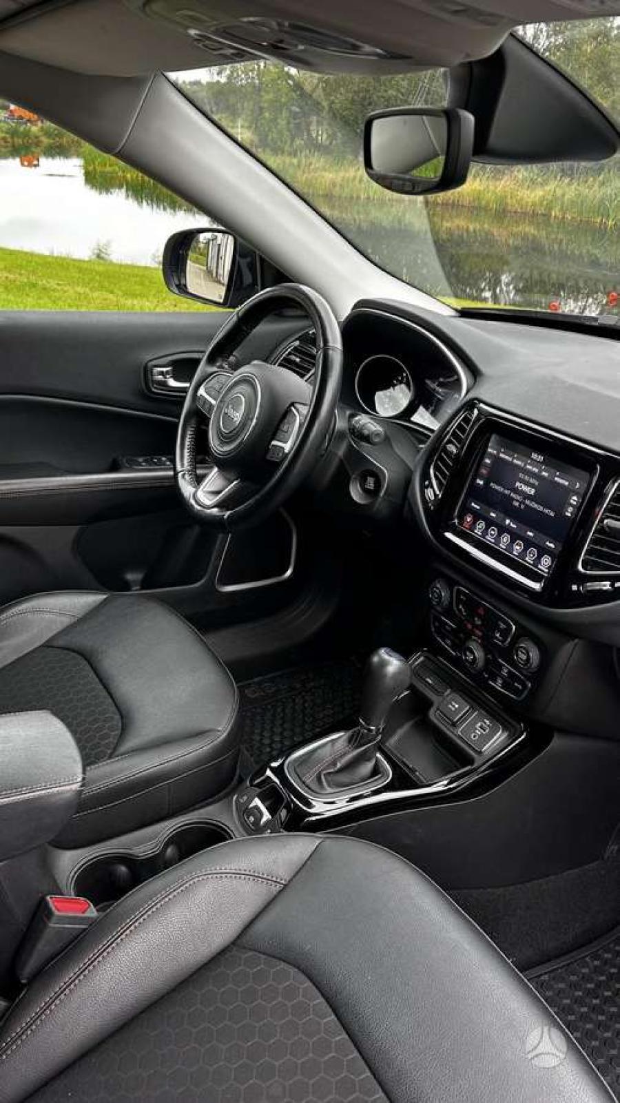 Black Jeep Compass 2020 in Utena, with an engine capacity of 1.33 L and mileage of 224 thousand km for 10890 €, photo 33 on AUTOMOTO.COM.LV