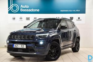 Blue Jeep Compass 2022 in Riga, with an engine capacity of 1.40 L and mileage of 60 thousand km for 28990 €, photo  on AUTOMOTO.COM.LV
