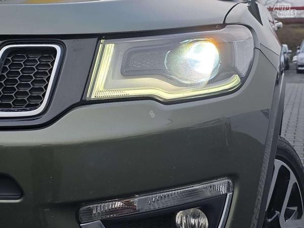 Green Jeep Compass 2018 in Kaunas, with an engine capacity of 1.40 L and mileage of 67 thousand km for 22067 €, photo 5 on AUTOMOTO.COM.LV