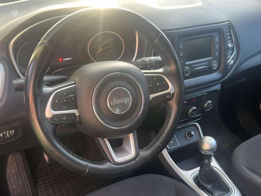 Grey Jeep Compass 2018 in Birzai, with an engine capacity of 1.60 L and mileage of 216 thousand km for 7700 €, photo 7 on AUTOMOTO.COM.LV