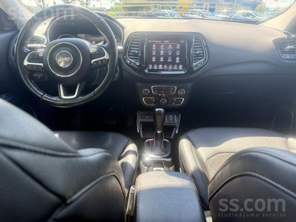 Grey Jeep Compass 2021 in Riga, with an engine capacity of 1.30 L and mileage of 80 thousand km for 16795 €, photo 10 on AUTOMOTO.COM.LV