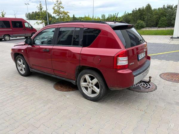 Red Jeep Compass 2010 in Vilnius, with an engine capacity of 1.97 L and mileage of 205 thousand km for 1400 €, photo 2 on AUTOMOTO.COM.LV