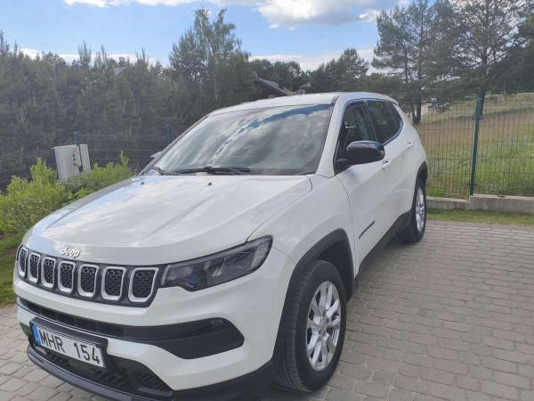 White Jeep Compass 2022 in Elektrenai, with an engine capacity of 1.33 L and mileage of 54 thousand km for 19900 €, photo 7 on AUTOMOTO.COM.LV