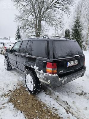 Melns Jeep Grand Cherokee 1997 Aizkraukle, ar dzinēja tilpumu 4.00 L un nobraukumu 250 tūkst. km par 3699 €, foto 3 vietnē AUTOMOTO.COM.LV