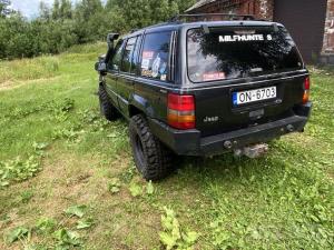 Black Jeep Grand Cherokee 1997 in Liepaja, with an engine capacity of 4.00 L and mileage of 328 thousand km for 4000 €, photo 8 on AUTOMOTO.COM.LV