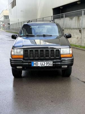 Black Jeep Grand Cherokee 1997 in Vilnius, with an engine capacity of 5.21 L and mileage of 461 thousand km for 5500 €, photo 4 on AUTOMOTO.COM.LV