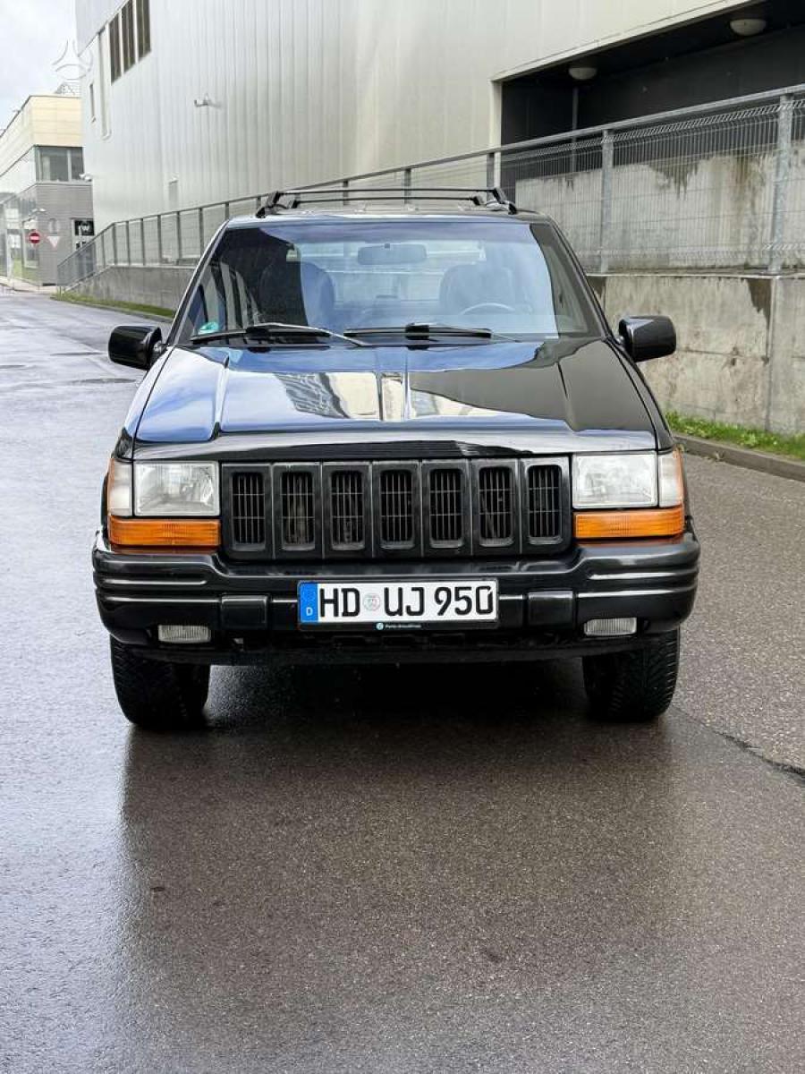 Black Jeep Grand Cherokee 1997 in Vilnius, with an engine capacity of 5.21 L and mileage of 461 thousand km for 5500 €, photo 4 on AUTOMOTO.COM.LV