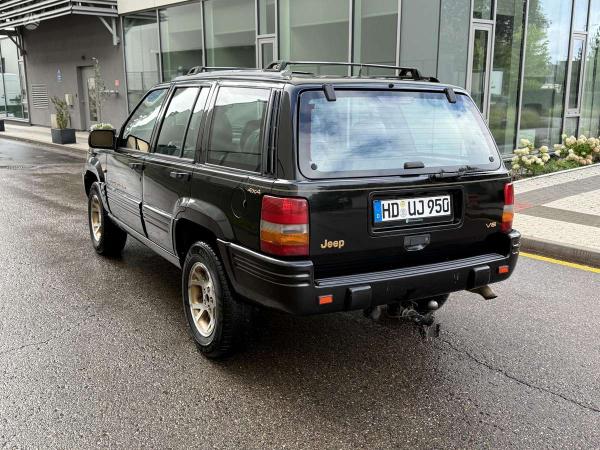Black Jeep Grand Cherokee 1997 in Vilnius, with an engine capacity of 5.21 L and mileage of 461 thousand km for 5500 €, photo 5 on AUTOMOTO.COM.LV