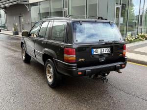 Black Jeep Grand Cherokee 1997 in Vilnius, with an engine capacity of 5.21 L and mileage of 461 thousand km for 5500 €, photo 5 on AUTOMOTO.COM.LV