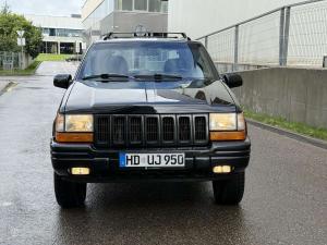 Black Jeep Grand Cherokee 1997 in Vilnius, with an engine capacity of 5.21 L and mileage of 461 thousand km for 5500 €, photo 6 on AUTOMOTO.COM.LV
