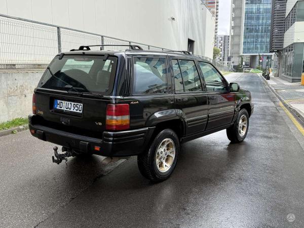 Black Jeep Grand Cherokee 1997 in Vilnius, with an engine capacity of 5.21 L and mileage of 461 thousand km for 5500 €, photo 7 on AUTOMOTO.COM.LV