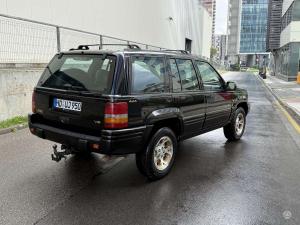 Black Jeep Grand Cherokee 1997 in Vilnius, with an engine capacity of 5.21 L and mileage of 461 thousand km for 5500 €, photo 7 on AUTOMOTO.COM.LV