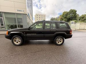 Black Jeep Grand Cherokee 1997 in Vilnius, with an engine capacity of 5.21 L and mileage of 461 thousand km for 5500 €, photo 9 on AUTOMOTO.COM.LV