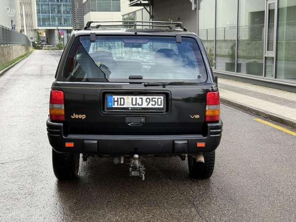 Black Jeep Grand Cherokee 1997 in Vilnius, with an engine capacity of 5.21 L and mileage of 461 thousand km for 5500 €, photo 10 on AUTOMOTO.COM.LV