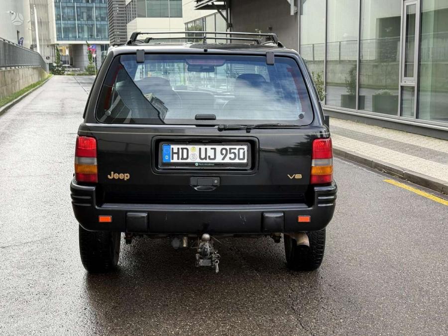 Black Jeep Grand Cherokee 1997 in Vilnius, with an engine capacity of 5.21 L and mileage of 461 thousand km for 5500 €, photo 10 on AUTOMOTO.COM.LV
