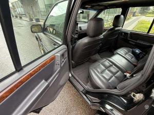 Black Jeep Grand Cherokee 1997 in Vilnius, with an engine capacity of 5.21 L and mileage of 461 thousand km for 5500 €, photo 14 on AUTOMOTO.COM.LV