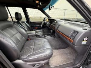Black Jeep Grand Cherokee 1997 in Vilnius, with an engine capacity of 5.21 L and mileage of 461 thousand km for 5500 €, photo 21 on AUTOMOTO.COM.LV