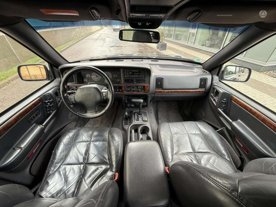 Black Jeep Grand Cherokee 1997 in Vilnius, with an engine capacity of 5.21 L and mileage of 461 thousand km for 5500 €, photo 23 on AUTOMOTO.COM.LV