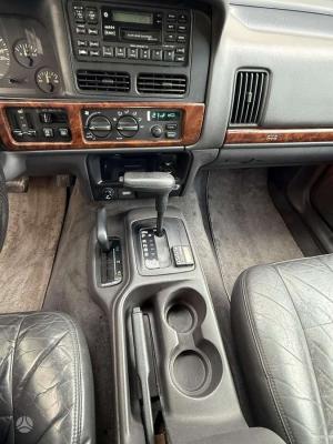 Black Jeep Grand Cherokee 1997 in Vilnius, with an engine capacity of 5.21 L and mileage of 461 thousand km for 5500 €, photo 27 on AUTOMOTO.COM.LV