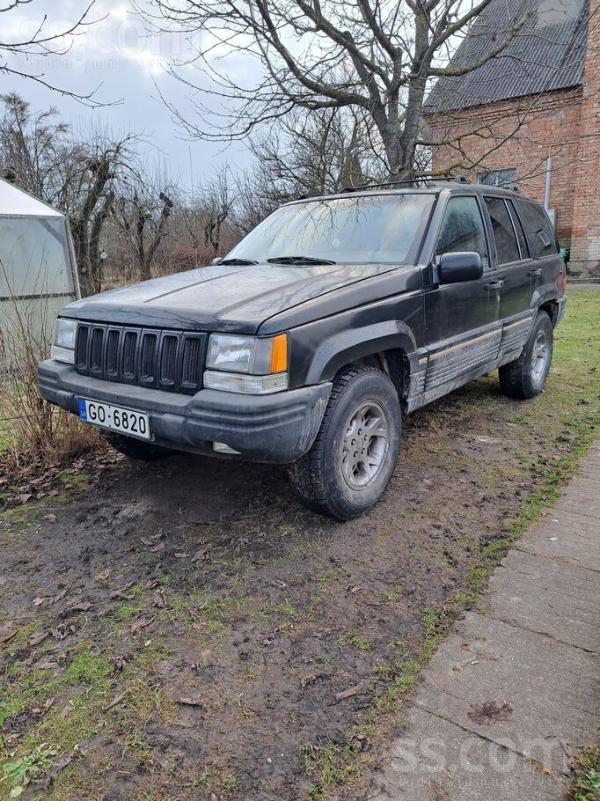 Black Jeep Grand Cherokee 1998 in Dobele, with an engine capacity of 5.20 L and mileage of 170 thousand km for 3800 €, photo 1 on AUTOMOTO.COM.LV