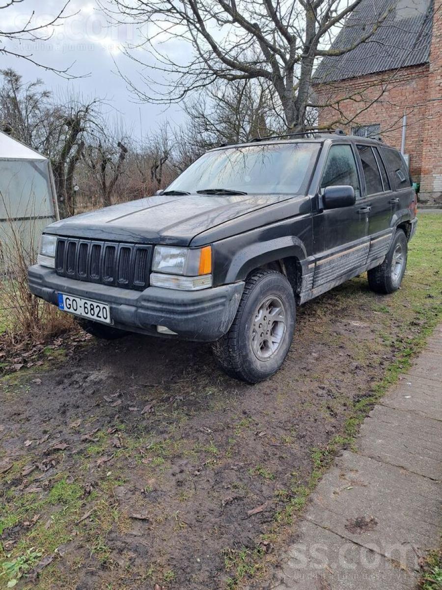 Black Jeep Grand Cherokee 1998 in Dobele, with an engine capacity of 5.20 L and mileage of 170 thousand km for 3800 €, photo 1 on AUTOMOTO.COM.LV