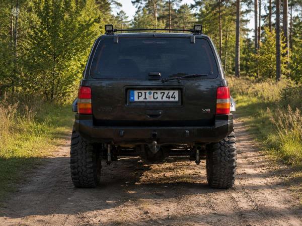 Черный Джип Гранд Чероки 1998 в Вильнюс, объемом двигателя 5.90 л и пробегом 301 тыс. км за 8500 €, фото 5 на AUTOMOTO.COM.LV