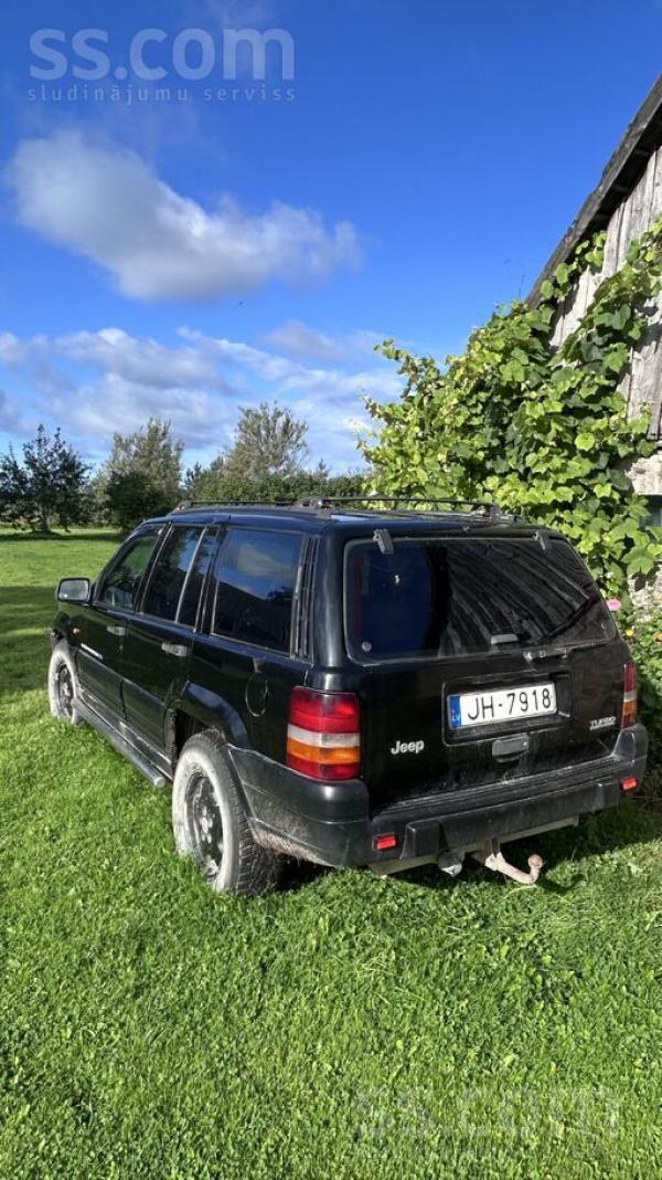 Black Jeep Grand Cherokee 1998 in Liepaja, with an engine capacity of 2.50 L and mileage of 0 thousand km for 545 €, photo 2 on AUTOMOTO.COM.LV