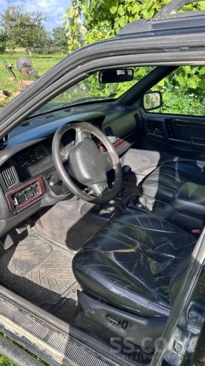 Black Jeep Grand Cherokee 1998 in Liepaja, with an engine capacity of 2.50 L and mileage of 0 thousand km for 545 €, photo 4 on AUTOMOTO.COM.LV