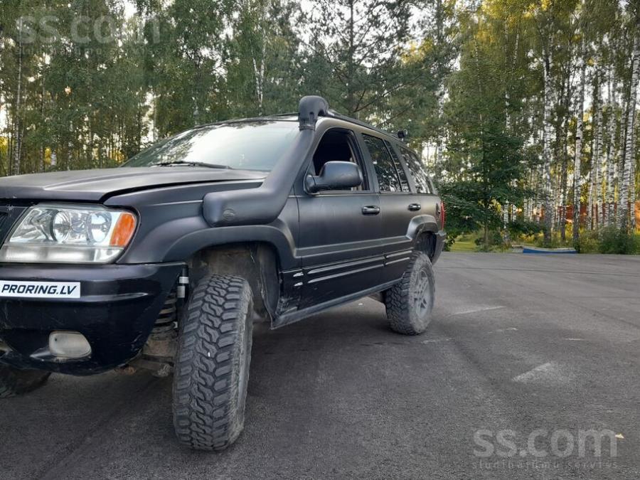 Black Jeep Grand Cherokee 1999 in Riga, with an engine capacity of 4.70 L and mileage of 213 thousand km for 4200 €, photo 1 on AUTOMOTO.COM.LV