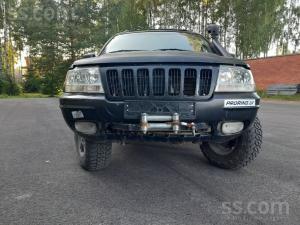 Black Jeep Grand Cherokee 1999 in Riga, with an engine capacity of 4.70 L and mileage of 213 thousand km for 4200 €, photo 2 on AUTOMOTO.COM.LV