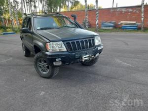 Black Jeep Grand Cherokee 1999 in Riga, with an engine capacity of 4.70 L and mileage of 213 thousand km for 4200 €, photo 3 on AUTOMOTO.COM.LV