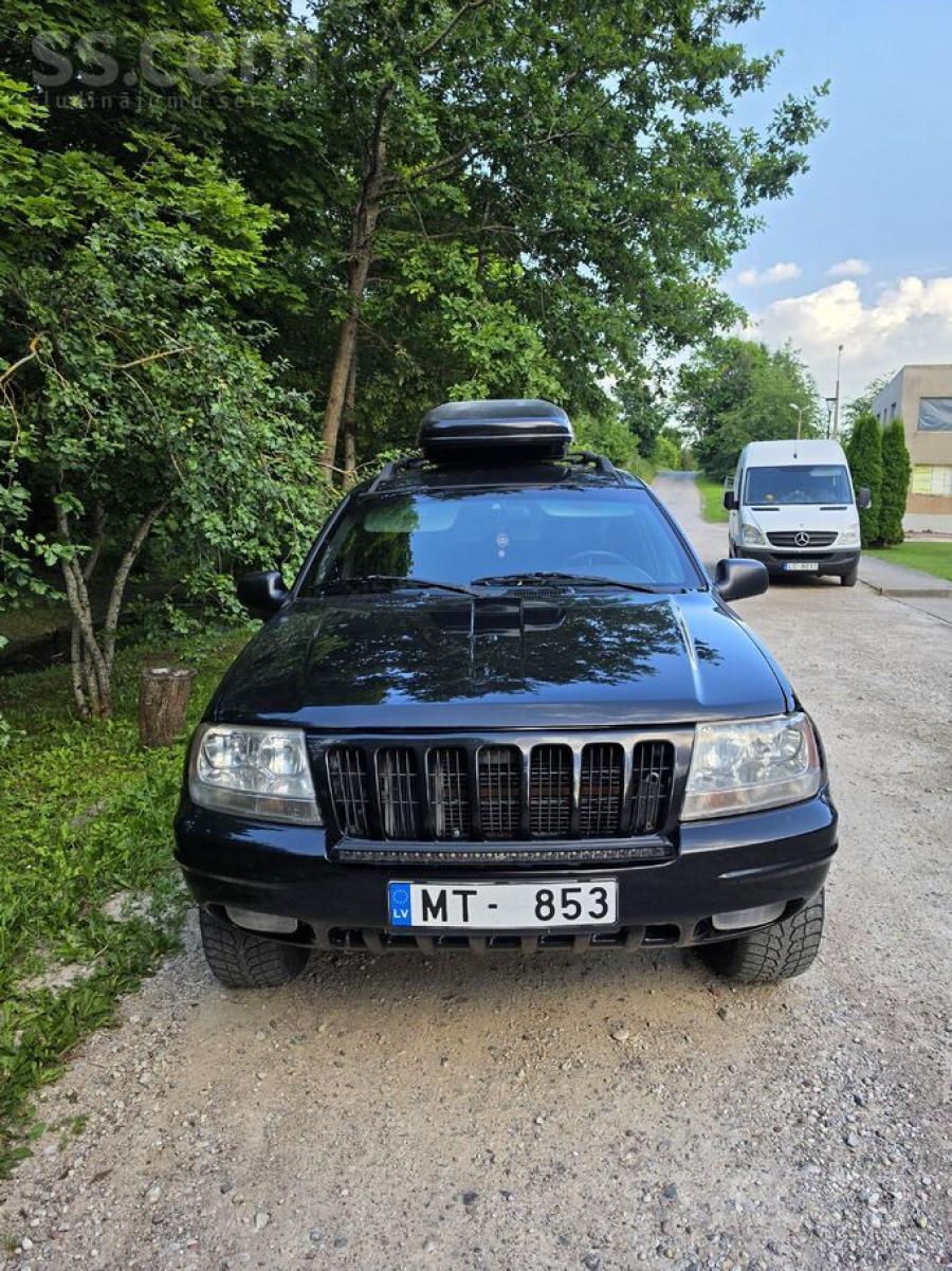 Melns Jeep Grand Cherokee 1999 Talsi, ar dzinēja tilpumu 4.70 L un nobraukumu 340 tūkst. km par 1950 €, foto 1 vietnē AUTOMOTO.COM.LV