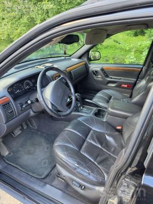 Melns Jeep Grand Cherokee 1999 Talsi, ar dzinēja tilpumu 4.70 L un nobraukumu 340 tūkst. km par 1950 €, foto 6 vietnē AUTOMOTO.COM.LV
