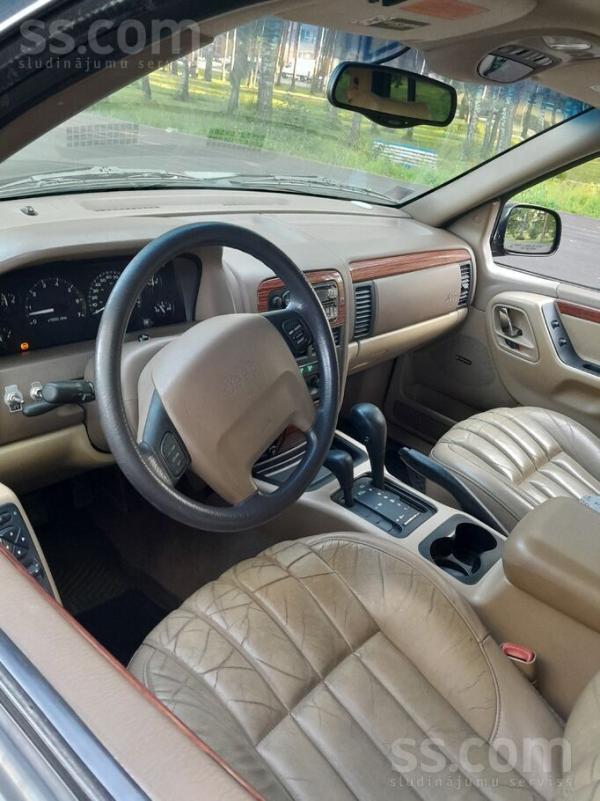 Jeep Grand Cherokee 1999 RÄ«ga vietnÄ Melns Jeep Grand Cherokee 1999 RÄ«ga, ar dzinÄja tilpumu 4.70 L un nobraukumu 265 tÅ«kst. km par 2850 ā¬, foto 5 vietnÄ AUTOMOTO.COM.LV
