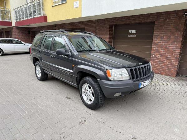 Black Jeep Grand Cherokee 2000 in Vilnius, with an engine capacity of 3.12 L and mileage of 230 thousand km for 1600 €, photo 2 on AUTOMOTO.COM.LV