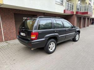 Black Jeep Grand Cherokee 2000 in Vilnius, with an engine capacity of 3.12 L and mileage of 230 thousand km for 1600 €, photo 4 on AUTOMOTO.COM.LV