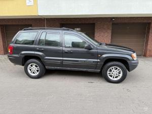Black Jeep Grand Cherokee 2000 in Vilnius, with an engine capacity of 3.12 L and mileage of 230 thousand km for 1600 €, photo 6 on AUTOMOTO.COM.LV