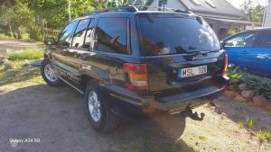 Melns Jeep Grand Cherokee 2000 Šauļi, ar dzinēja tilpumu 3.96 L un nobraukumu 300 tūkst. km par 1999 €, foto 4 vietnē AUTOMOTO.COM.LV