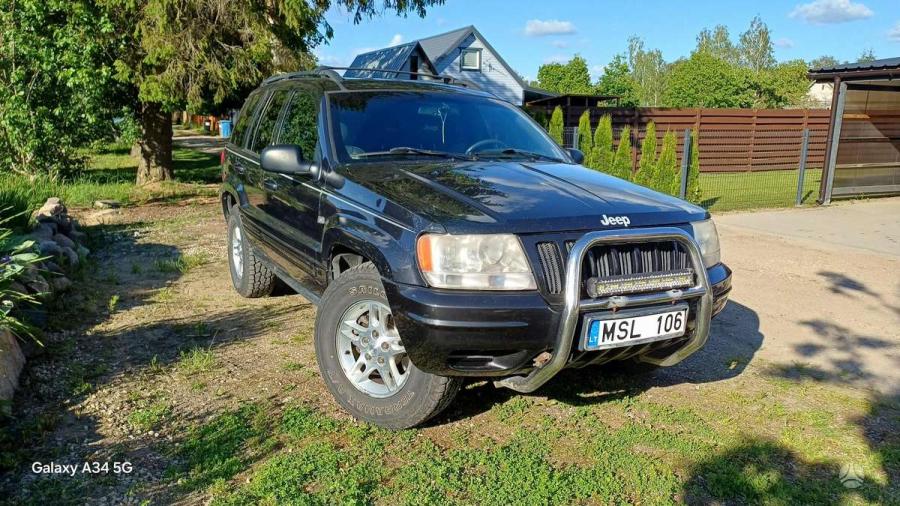 Melns Jeep Grand Cherokee 2000 Šauļi, ar dzinēja tilpumu 3.96 L un nobraukumu 300 tūkst. km par 1999 €, foto 5 vietnē AUTOMOTO.COM.LV