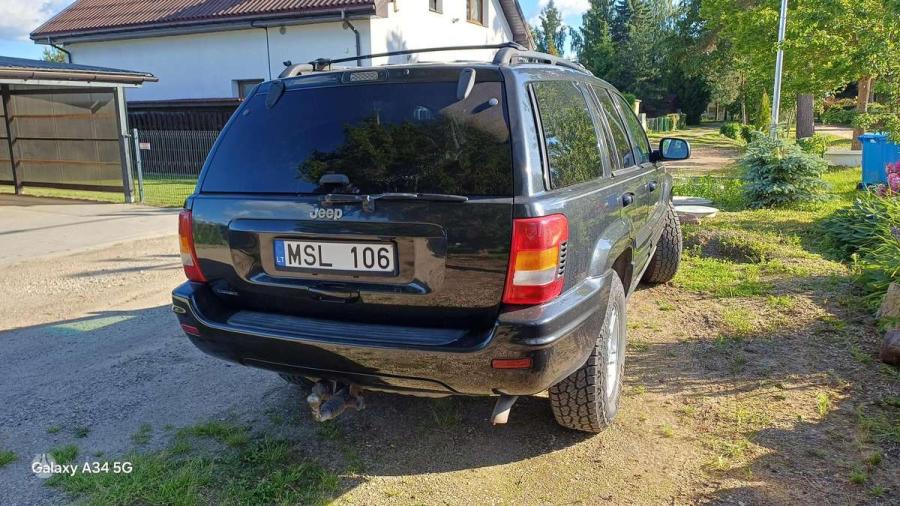 Melns Jeep Grand Cherokee 2000 Šauļi, ar dzinēja tilpumu 3.96 L un nobraukumu 300 tūkst. km par 1999 €, foto 6 vietnē AUTOMOTO.COM.LV