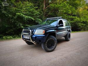 Black Jeep Grand Cherokee 2000 in Radviliskis, with an engine capacity of 4.70 L and mileage of 182 thousand km for 8000 €, photo  on AUTOMOTO.COM.LV