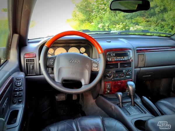 Black Jeep Grand Cherokee 2000 in Radviliskis, with an engine capacity of 4.70 L and mileage of 182 thousand km for 8000 €, photo 7 on AUTOMOTO.COM.LV